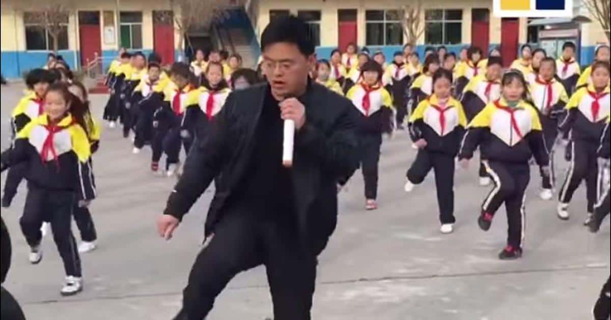 Students Doing The Shuffle Dance With Principal