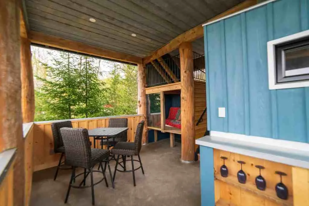 This incredible 2-story treehouse is built entirely from reclaimed ...