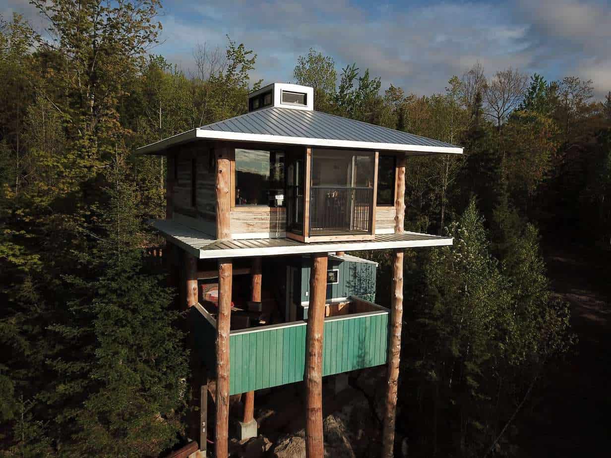 This incredible 2-story treehouse is built entirely from reclaimed ...