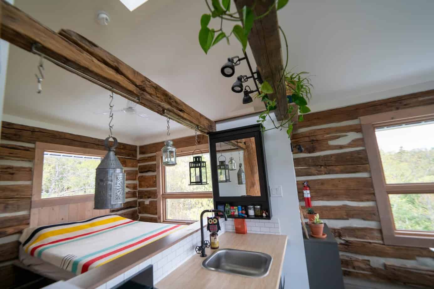 This incredible 2-story treehouse is built entirely from reclaimed ...