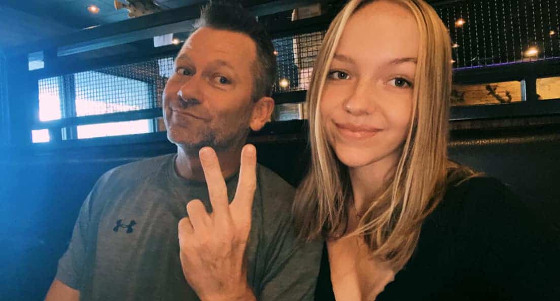 Brother dives into water and fights off shark to rescue sister