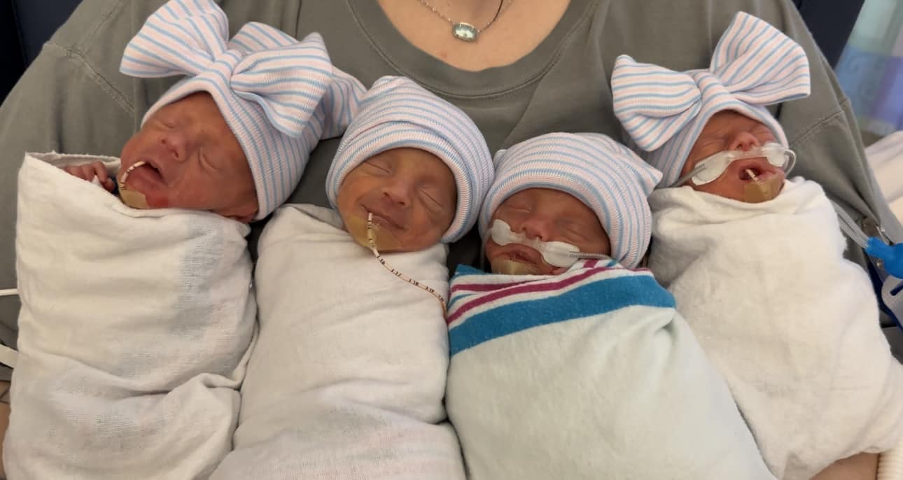 Couple welcomes rare quadruplets with two sets of identical twins