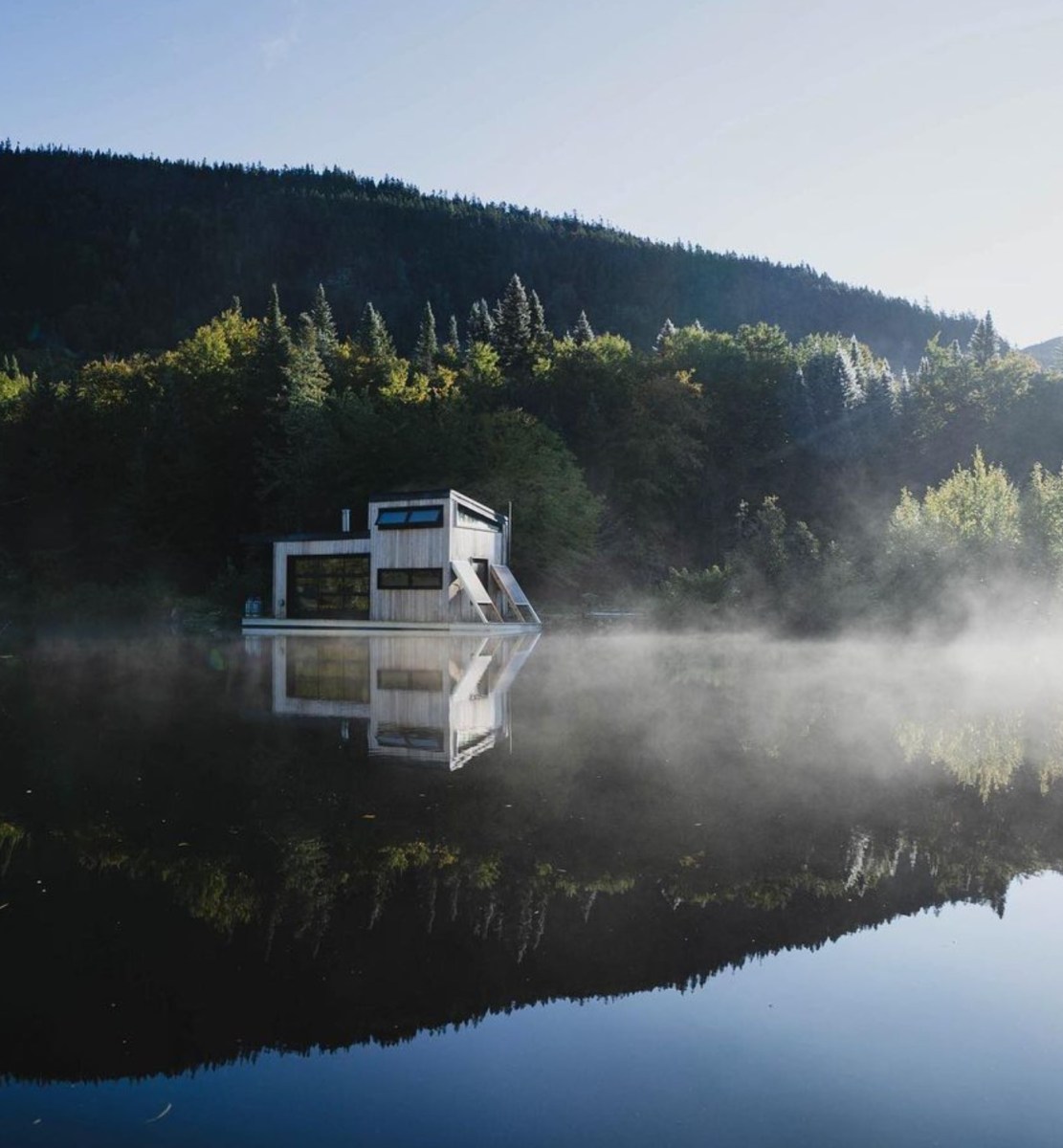Step into a floating tiny house on a small lake