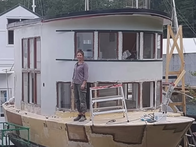Couple transforms derelict boat into stunning tiny boat house