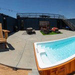 Man builds home made from shipping containers with a pool