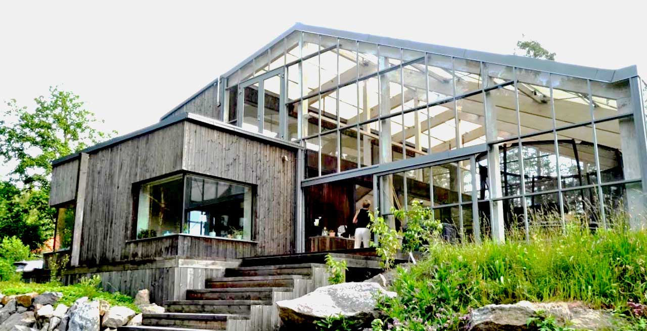Inside a self‑sufficient greenhouse home lifestyle